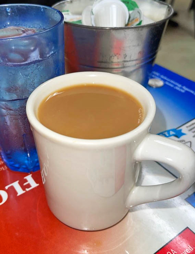 Coffee at Flo's comes in these sturdy white mugs&mdash;the kind that say "I'm not here to look pretty, I'm here to wake you up."
