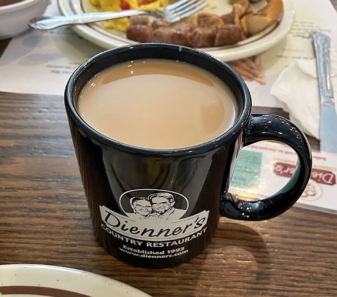 That coffee mug says it all – sturdy, unpretentious, and filled with the kind of brew that keeps conversations flowing and pairs perfectly with dessert.