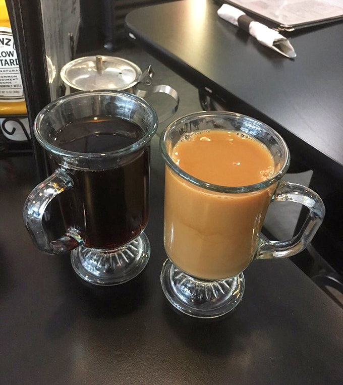 Coffee served in glass mugs—because when something tastes this good, you deserve to watch it disappear with style.