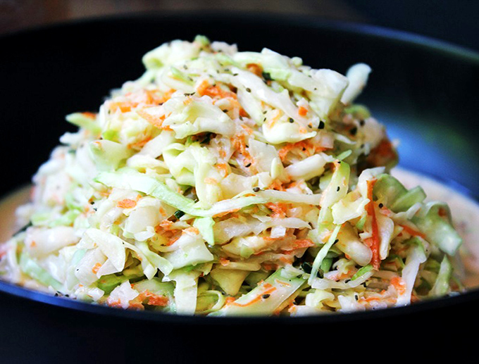 Fresh coleslaw that's crunchy, tangy, and exactly what your barbecue needs to reach its full potential.