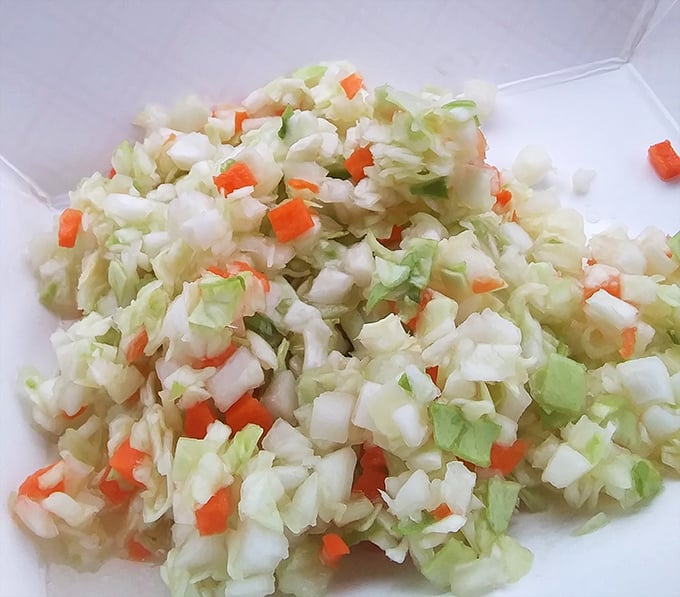 Coleslaw that actually deserves a place on your plate rather than being pushed aside. Fresh, crisp, and the perfect counterpoint to fried indulgence.