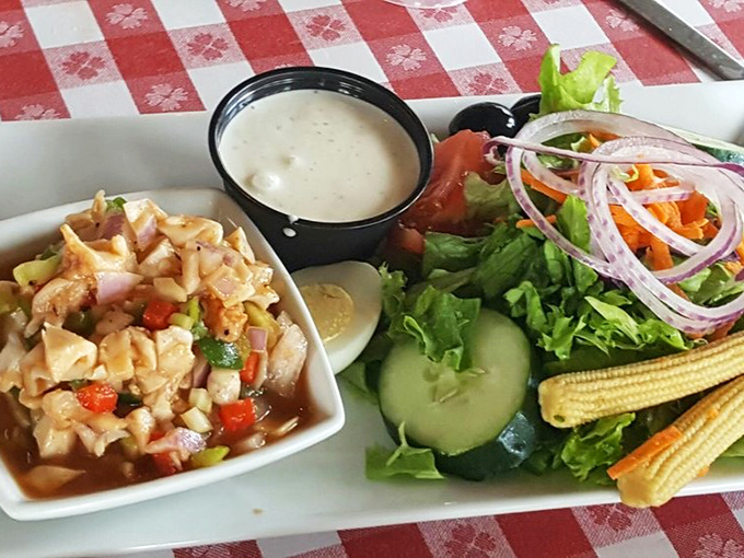 The ocean's ceviche &ndash; conch salad paired with a garden-fresh side. It's like summer vacation decided to become a meal.