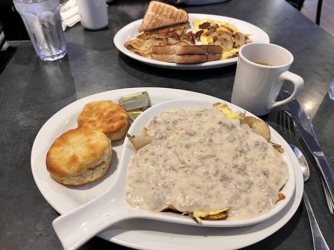 Breakfast heaven arrives in the form of country omelets smothered in gravy alongside a fluffy biscuit&mdash;the kind of morning fuel that powers lake adventures.