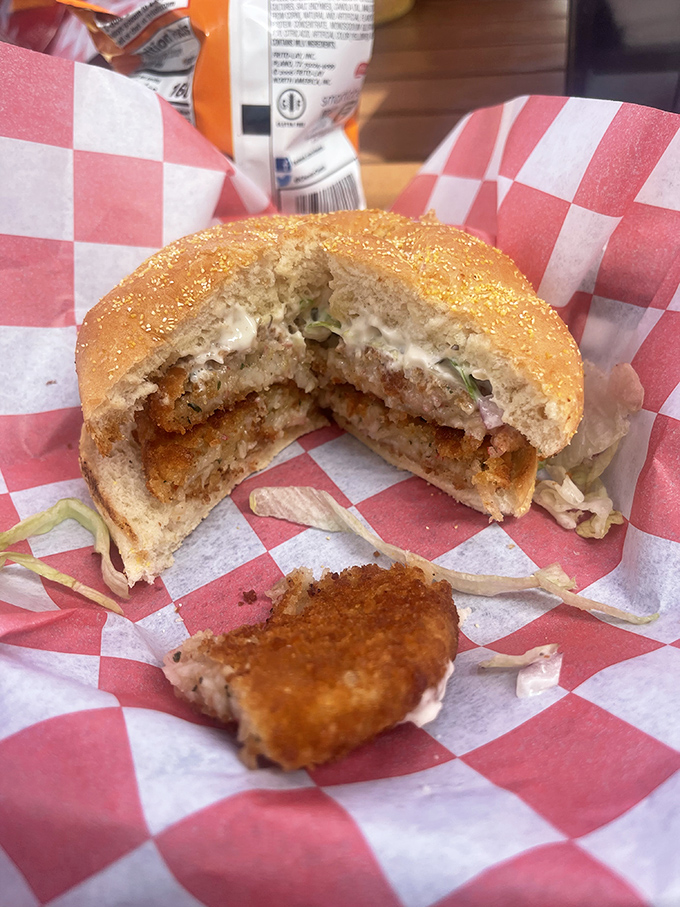 The sandwich that launched a thousand road trips. This golden-fried crab cake on a soft bun is what seafood dreams are made of.