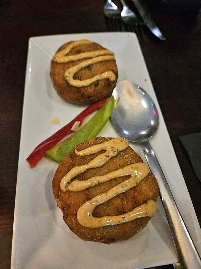 These crab cakes aren't just appetizers—they're an opening act that threatens to upstage the headliner. Crispy, golden perfection.