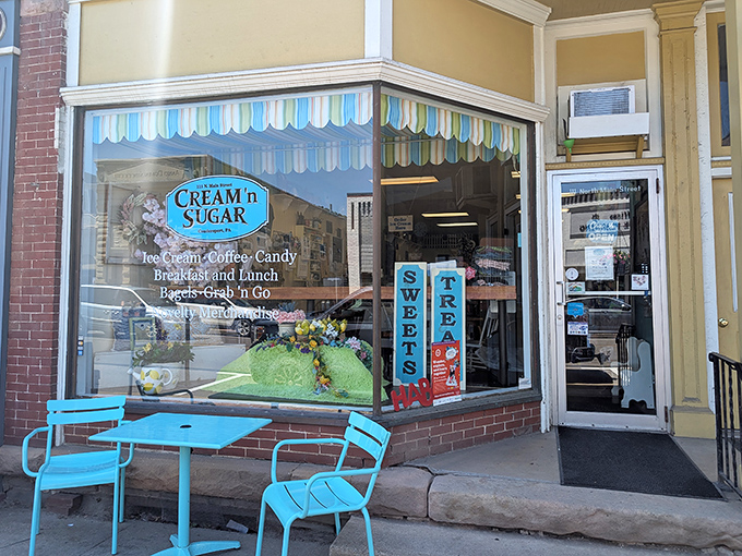Cream 'n Sugar's cheerful blue chairs invite you to linger over coffee and homemade treats while watching small-town life unfold before you.