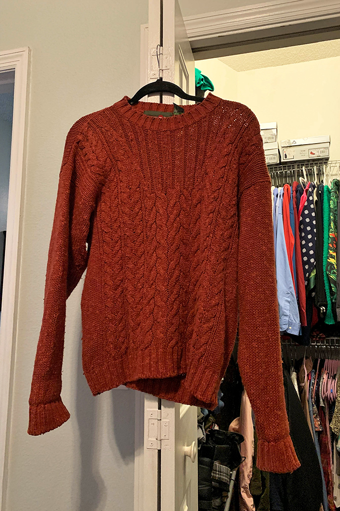 This rustic cable-knit sweater isn't just clothing; it's autumn in Florida, waiting for that one cool evening when Floridians finally break out the "winter" wear.