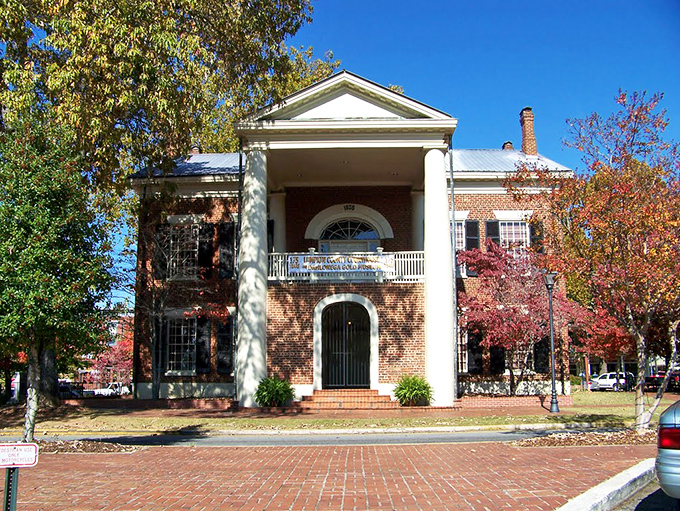The stately Gold Museum, housed in the old courthouse, guards Dahlonega's glittering past with columned dignity and brick-paved approaches.