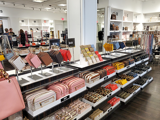 Wallet temptation central! This accessories wall showcases the art of organization&mdash;something your overflowing purse collection desperately needs.