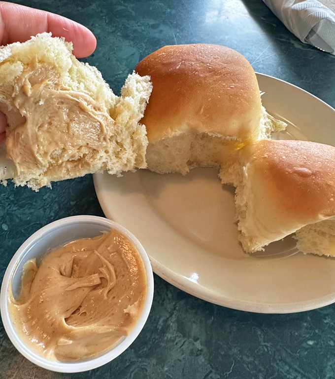 Fresh dinner rolls served with Amish peanut butter spread&mdash;a combination that'll ruin regular bread and butter forever.