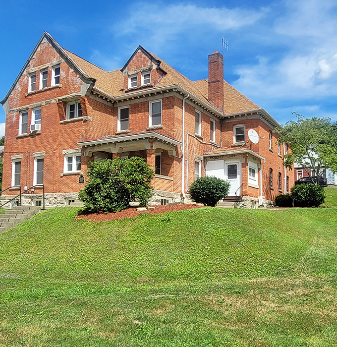 This brick beauty has witnessed more small-town drama than a season of Mayberry R.F.D., all while maintaining its architectural dignity.