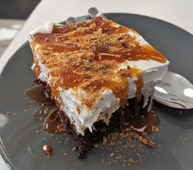 Holy Cow Cake indeed&mdash;layers of chocolate decadence topped with clouds of whipped cream and caramel that would make angels weep with joy.