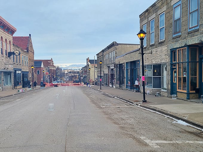 Winter casts a peaceful spell over downtown, where the absence of franchise logos feels like a rebellious act in today's homogenized landscape.