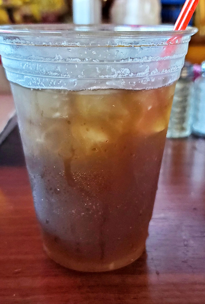 Even the iced tea comes with no pretense&mdash;just honest refreshment in a plastic cup. Sometimes thirst just needs straightforward solutions.