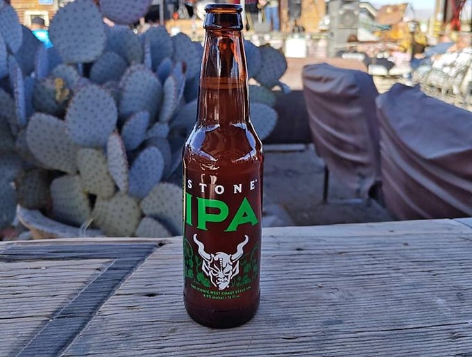 Desert wisdom: After miles of highway hypnosis, a cold Stone IPA against the backdrop of prickly pear cactus tastes like liquid salvation.