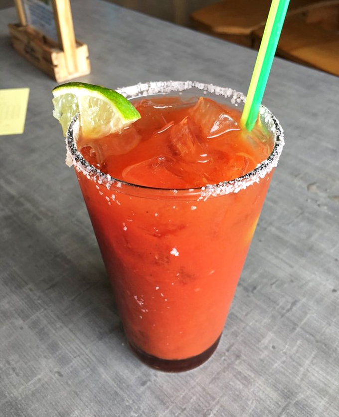 This vibrant cocktail with its salt-rimmed glass isn't just a drink&mdash;it's the liquid embodiment of vacation mode.