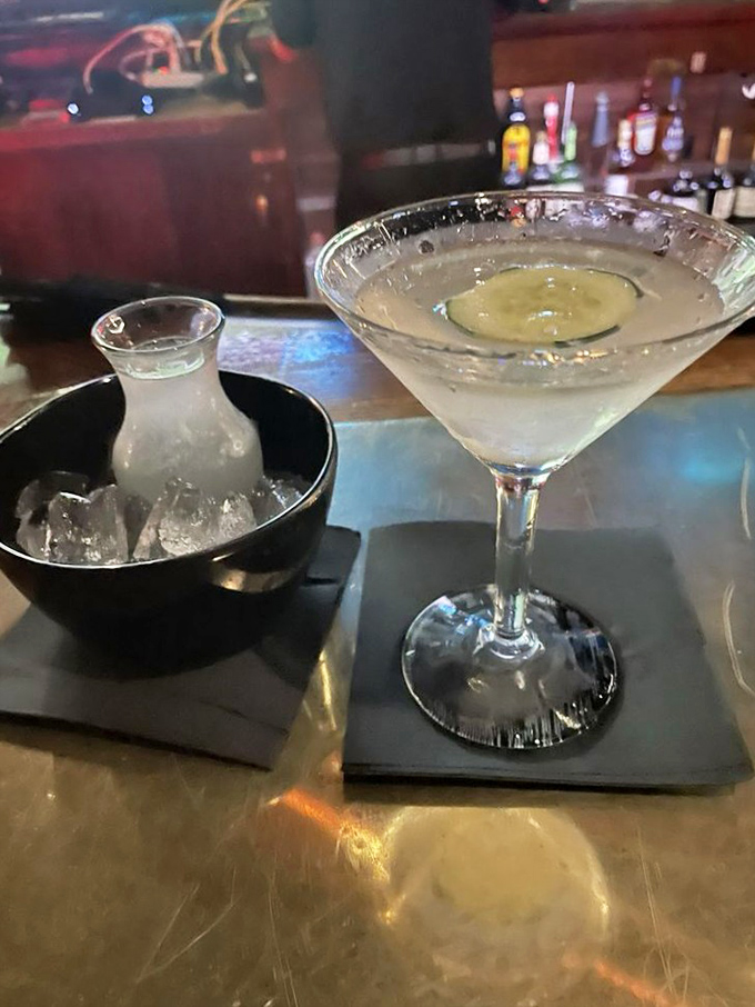A properly chilled martini with a side of extra martini. The kind of drink that makes mundane conversations suddenly fascinating.