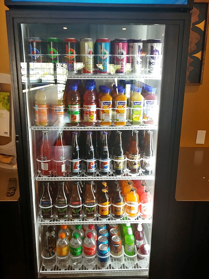The beverage cooler stocks everything from craft sodas to familiar favorites, ensuring nobody goes thirsty during burger season.