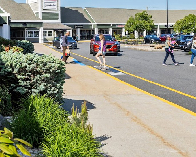 Stroll through the sun-soaked walkways and discover your favorite brands while enjoying a perfect day of shopping in outdoor Maine.