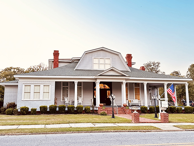 The Edenfield House stands as a testament to Southern architecture, complete with wraparound porch perfect for sweet tea sipping.