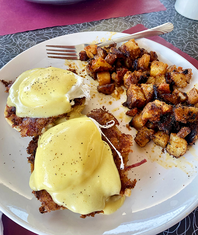 These Eggs Benedict aren't just breakfast&mdash;they're a sunrise masterpiece with hollandaise so rich it should have its own tax bracket.