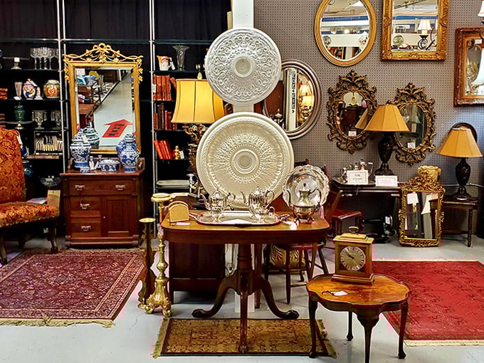 Ornate ceiling medallions meet elegant furnishings in this booth that screams, "Yes, you too can live like Downtown Abbey."