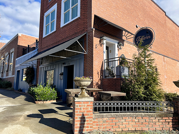 Elk Ave Tavern's charming brick exterior and wrought iron details invite you in for what promises to be a memorable meal without a metropolitan markup.