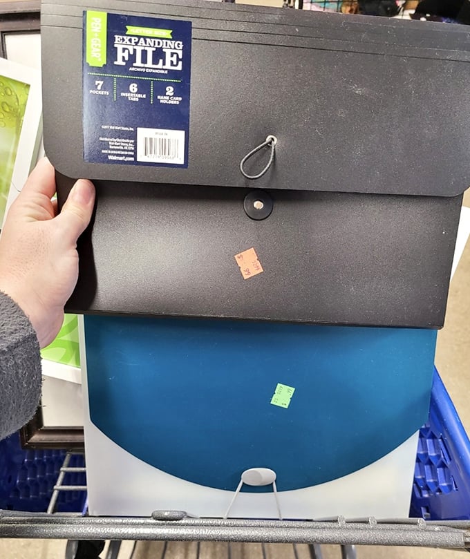 Office supplies with previous lives. These expanding files once organized someone else's important documents; now they await your tax receipts and warranties.