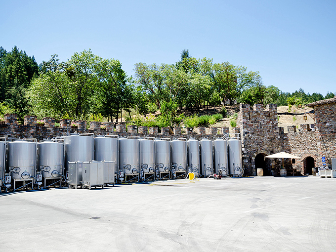 Where medieval meets modern&mdash;stainless steel tanks stand guard against ancient stone walls. Even Merlin would approve of this technological upgrade.