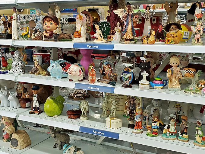 A ceramic menagerie awaits adoption. These figurines once graced grandmothers' curio cabinets before finding themselves in this charming limbo of possibility.
