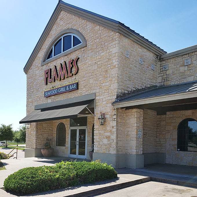 Flames Seafood Grill & Bar proves you don't need an ocean view to enjoy fresh seafood. That limestone exterior houses coastal flavors in landlocked Texas.
