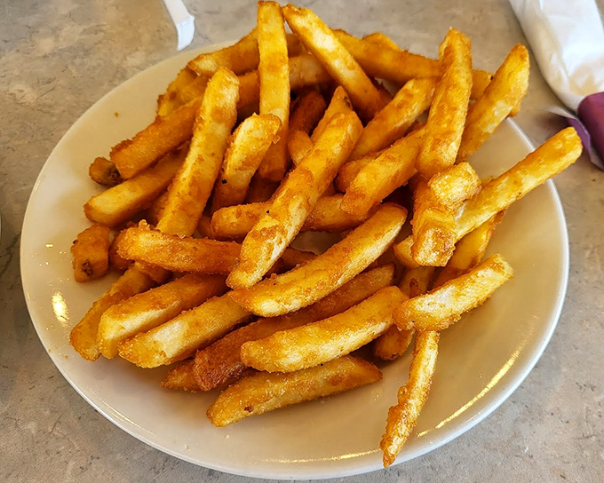 French fries golden enough to make Fort Knox jealous. Crispy on the outside, fluffy within &ndash; the potato's highest calling.