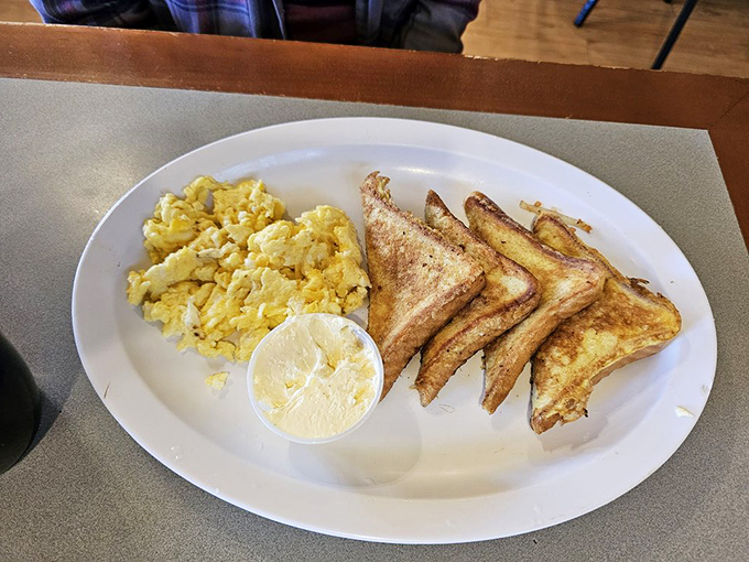 French toast triangles standing at attention like delicious soldiers, ready to conquer your morning hunger with cinnamon-sugar artillery.