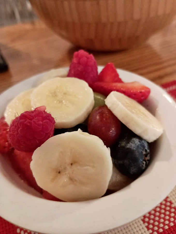 A bowl of fresh fruit that's so vibrant and perfectly ripe, it makes you wonder if Florida and France have been secretly collaborating.