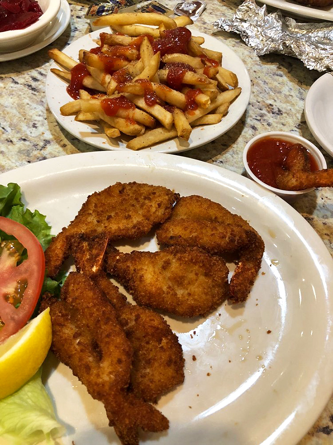 Golden-fried shrimp and ketchup-kissed fries &ndash; the dynamic duo of diner delights that never disappoints, no matter what coast you're on.
