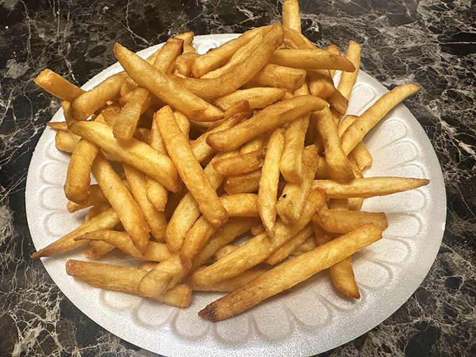 Golden fries that achieve that mythical balance&mdash;crisp exterior, fluffy interior, and just enough salt to make you reach for "just one more" until they're gone.