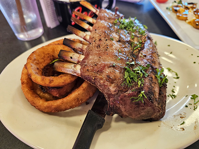A rack of lamb that makes you wonder if you've accidentally wandered into a fine dining establishment. Those onion rings aren't playing around either.
