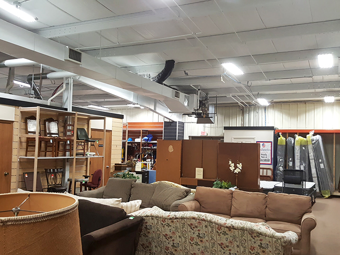 The furniture section: where mid-century meets 90s chic meets "grandma's basement special." That floral couch has stories to tell.