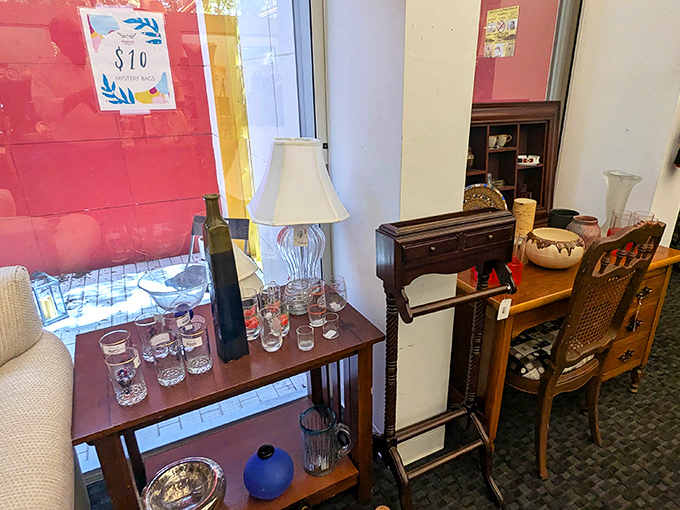 Furniture vignettes create little moments of domestic possibility, each piece waiting to star in someone's "before and after" home makeover story.