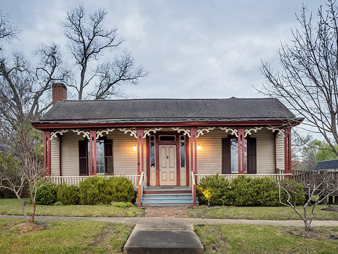 This charming historic cottage showcases the architectural character that makes Demopolis feel like a living postcard from another era.