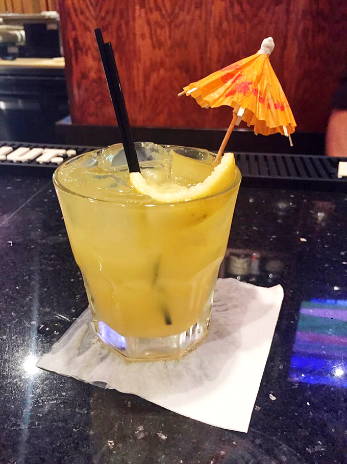 This isn't just a drink; it's a vacation in a glass, complete with the tiny umbrella that somehow makes everything taste 30% more festive.