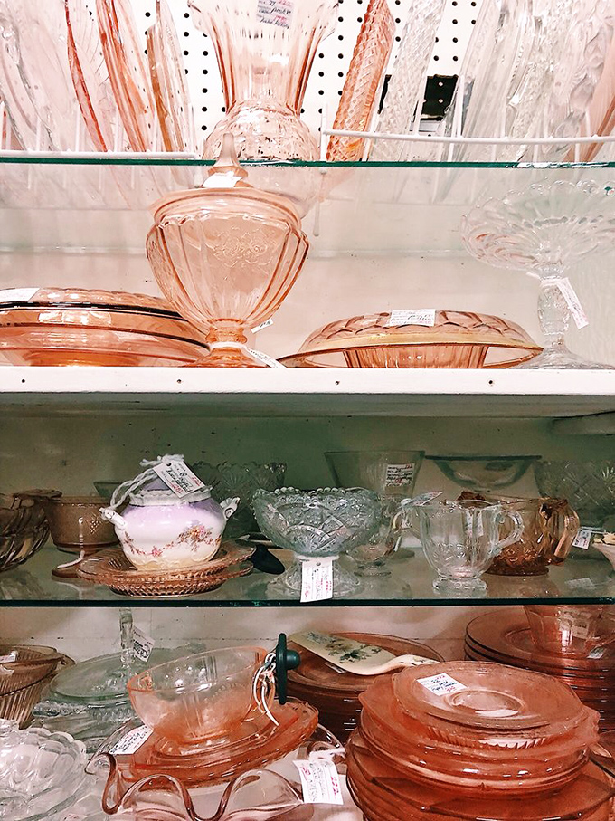 Pink Depression glass catching light like crystallized nostalgia. Grandma's Sunday dinners feel just one purchase away.