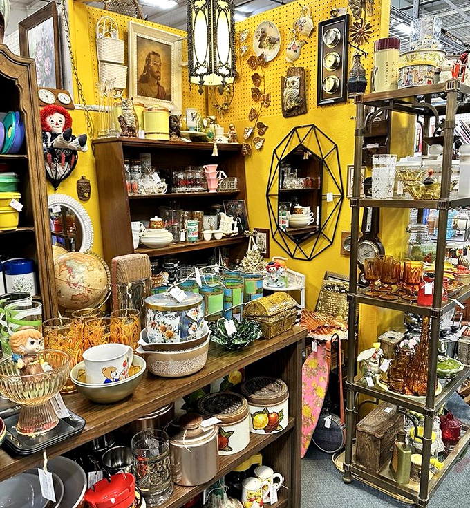 This sunny yellow booth is like stepping into Wes Anderson's prop department—meticulously arranged treasures in a perfectly curated vignette.
