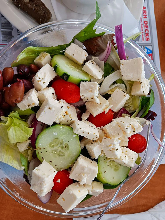 This Greek salad with generous feta cubes isn't just a meal&mdash;it's a Mediterranean vacation without the passport. Those olives mean business!