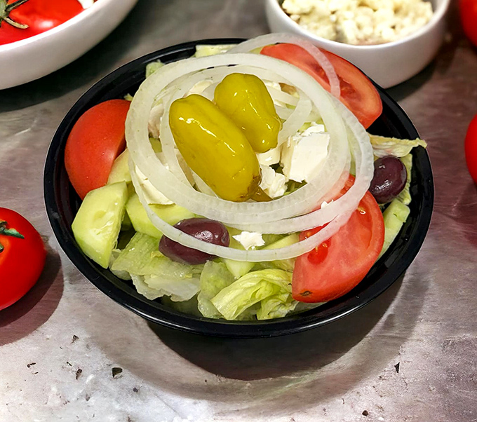 A Greek salad that actually tastes like vegetables instead of just a delivery system for dressing.