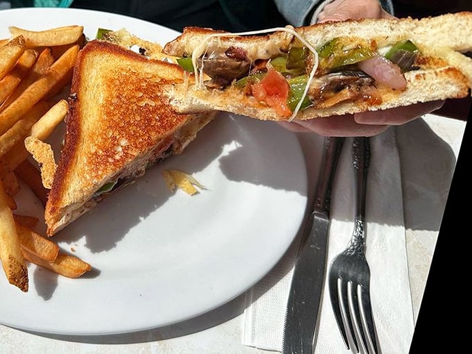 When sandwiches get dressed up for a night out&mdash;toasted bread hugging melted cheese and colorful veggies with fries standing by for moral support.