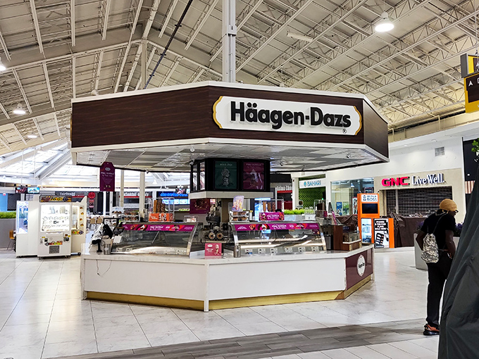 The Häagen-Dazs oasis, where shoppers negotiate with themselves: "I've walked 12,000 steps today, so this double scoop is basically a protein shake."