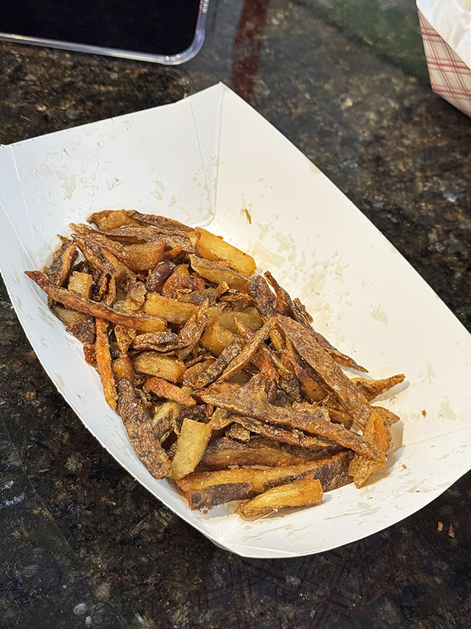 Hand-cut fries that put frozen imposters to shame. Each golden stick carries the perfect balance of crispy exterior and fluffy potato soul.