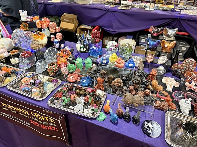 Miniature treasures with maximum charm. This purple-draped wonderland of handcrafted figurines and crystals proves one person's knickknack is another's conversation piece.