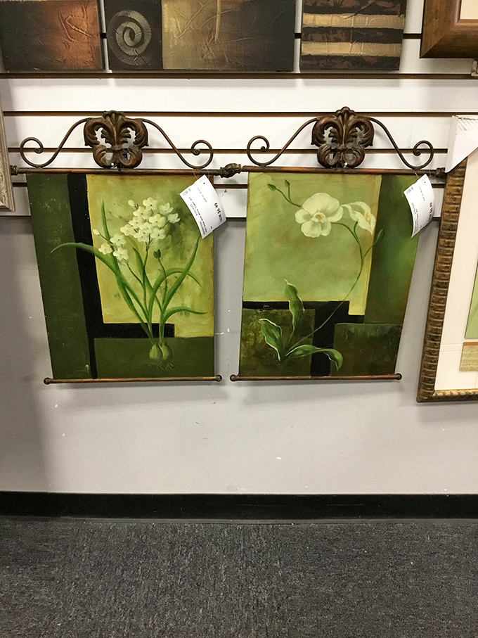 Botanical art that brings garden vibes indoors without requiring water, sunlight, or conversations with your plants.